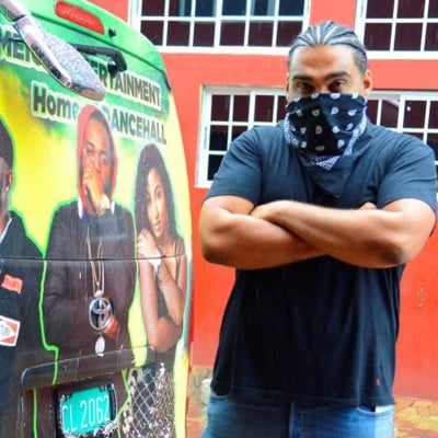 Dancehall Producer Romeich Gifts Employee A Brand New Car - DancehallMag