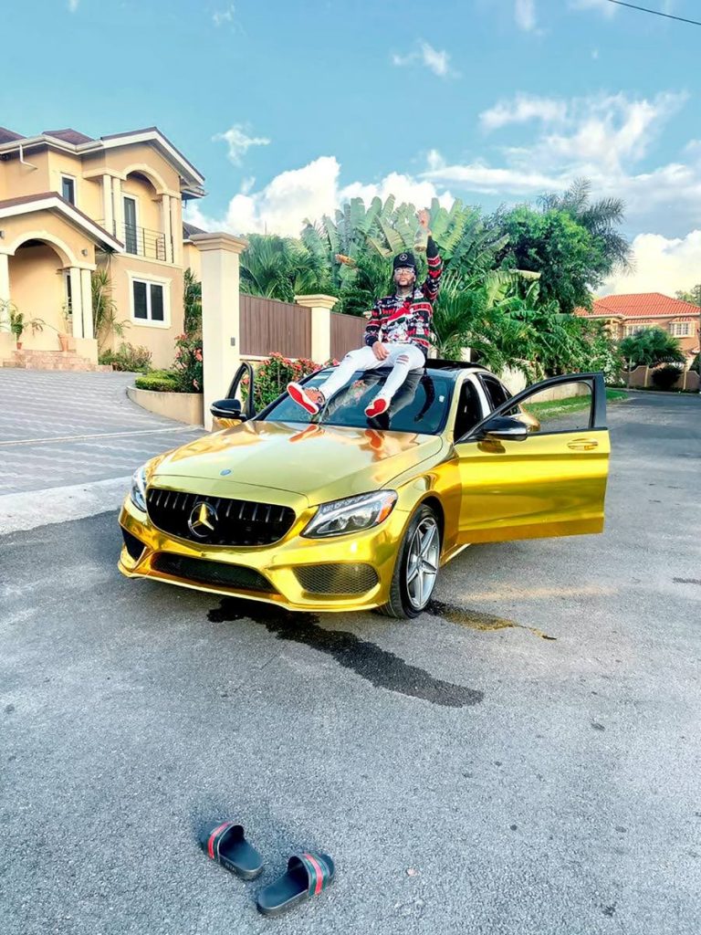 Gold Gad Drops US$100,000 On New Gold Mercedes Benz - DancehallMag